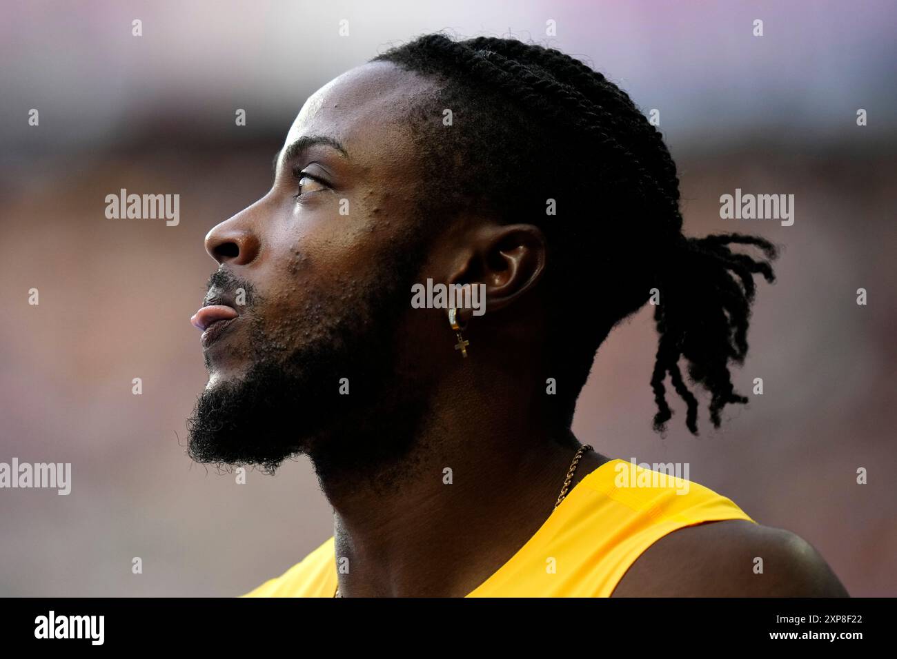 Kishane Thompson, of Jamaica, looks on after competing in a men's 100 ...