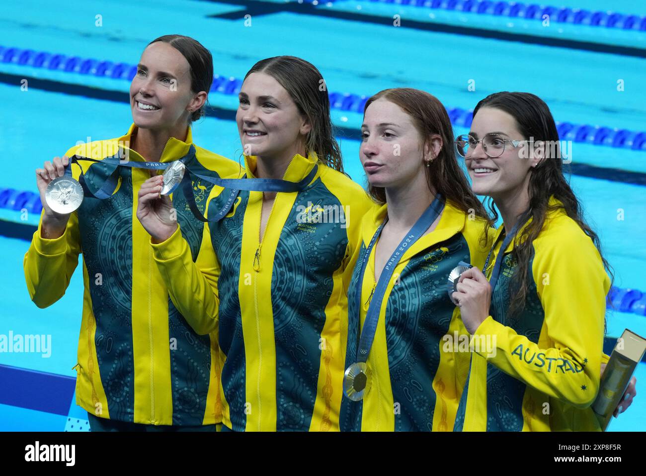 Members of Australia celebrate during an award ceremony of the swimming ...