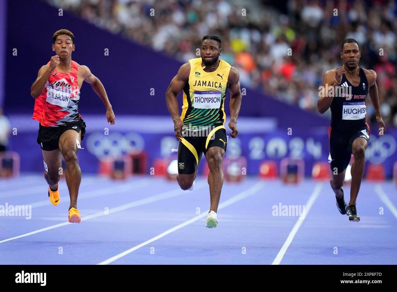 Kishane Thompson, of Jamaica, wins a heat in the men's 100-meter ...