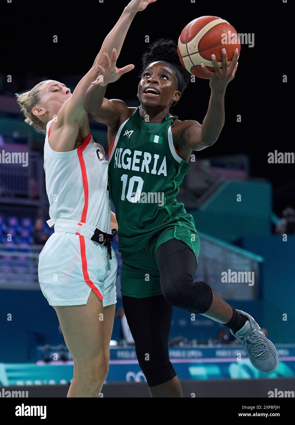 Lille, France. 4th Aug, 2024. Promise Amukamara (R) of Nigeria competes ...