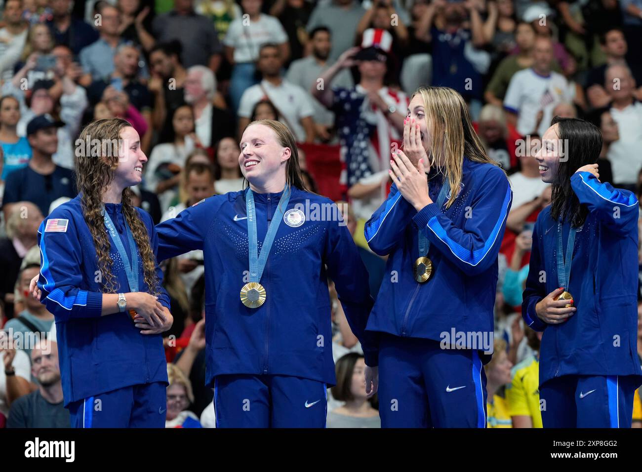United States' gold medalists Regan Smith, Lilly King, Gretchen Walsh ...
