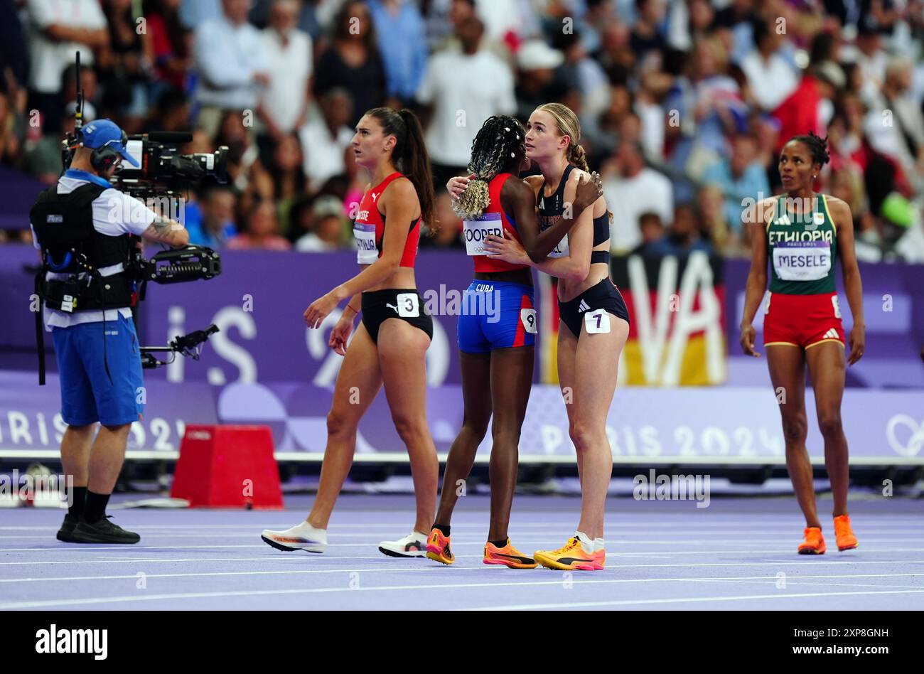 Great Britain's Phoebe Gill (right) with Cuba's Daily Cooper following ...