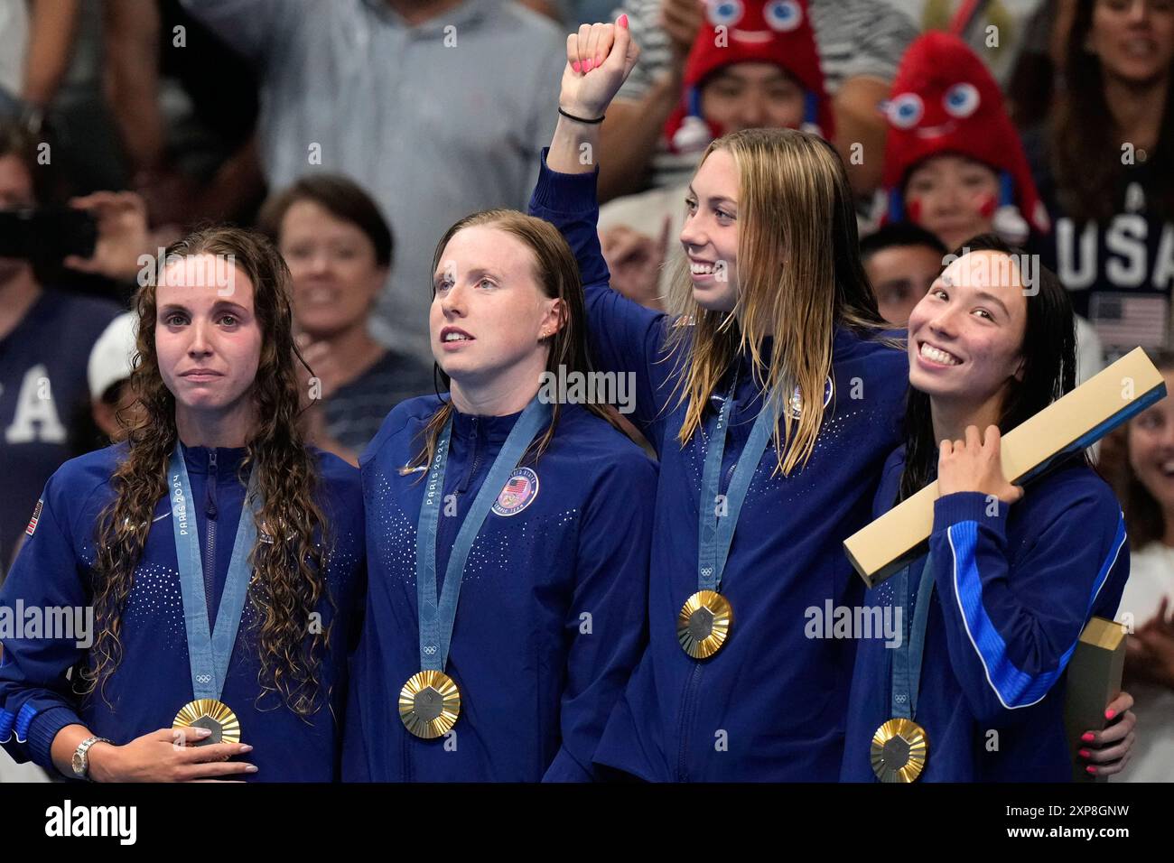 United States' gold medalists Regan Smith, Lilly King, Gretchen Walsh ...