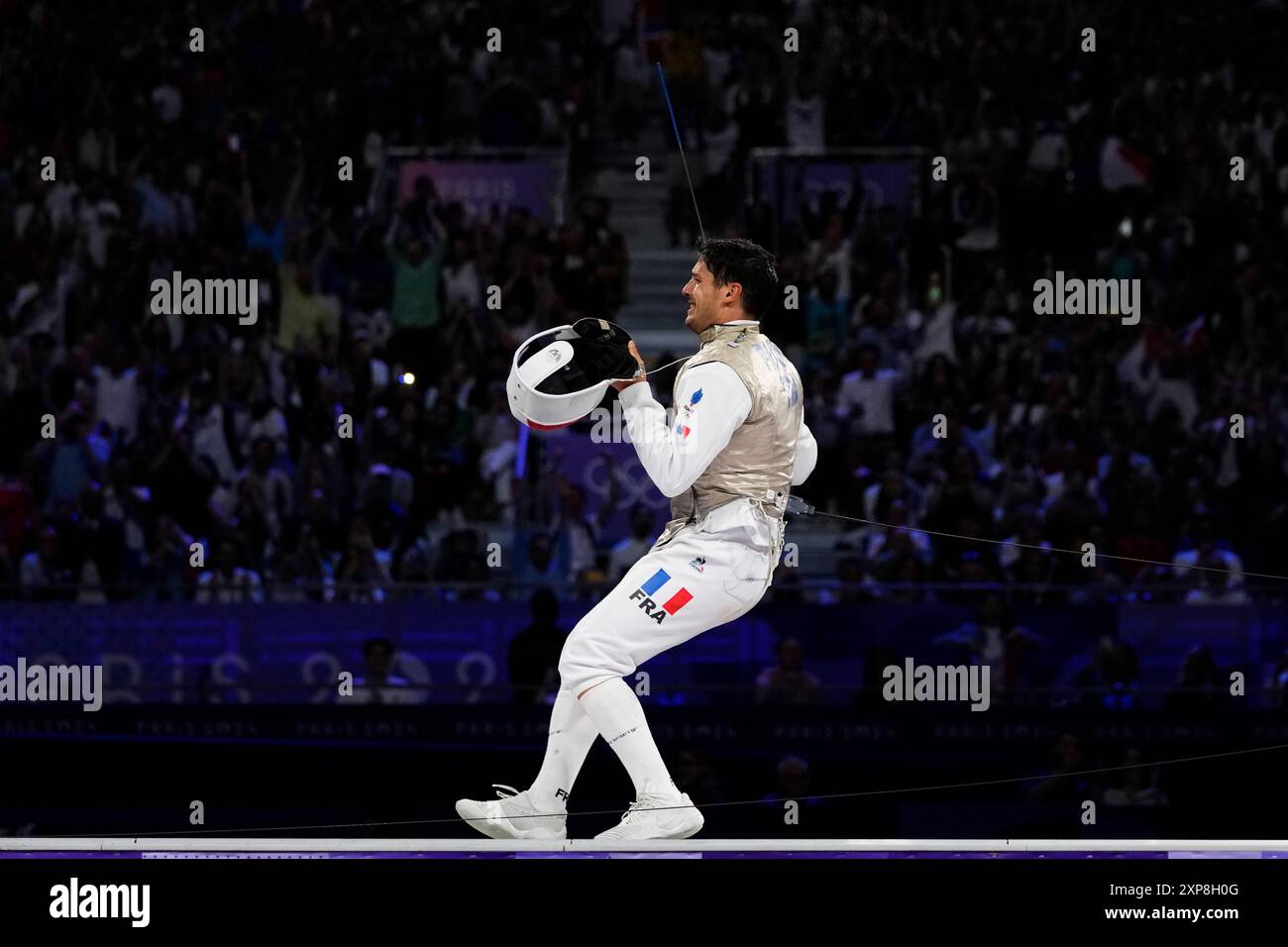 France's Maxime Pauty celebrates after winning the men's team foil ...
