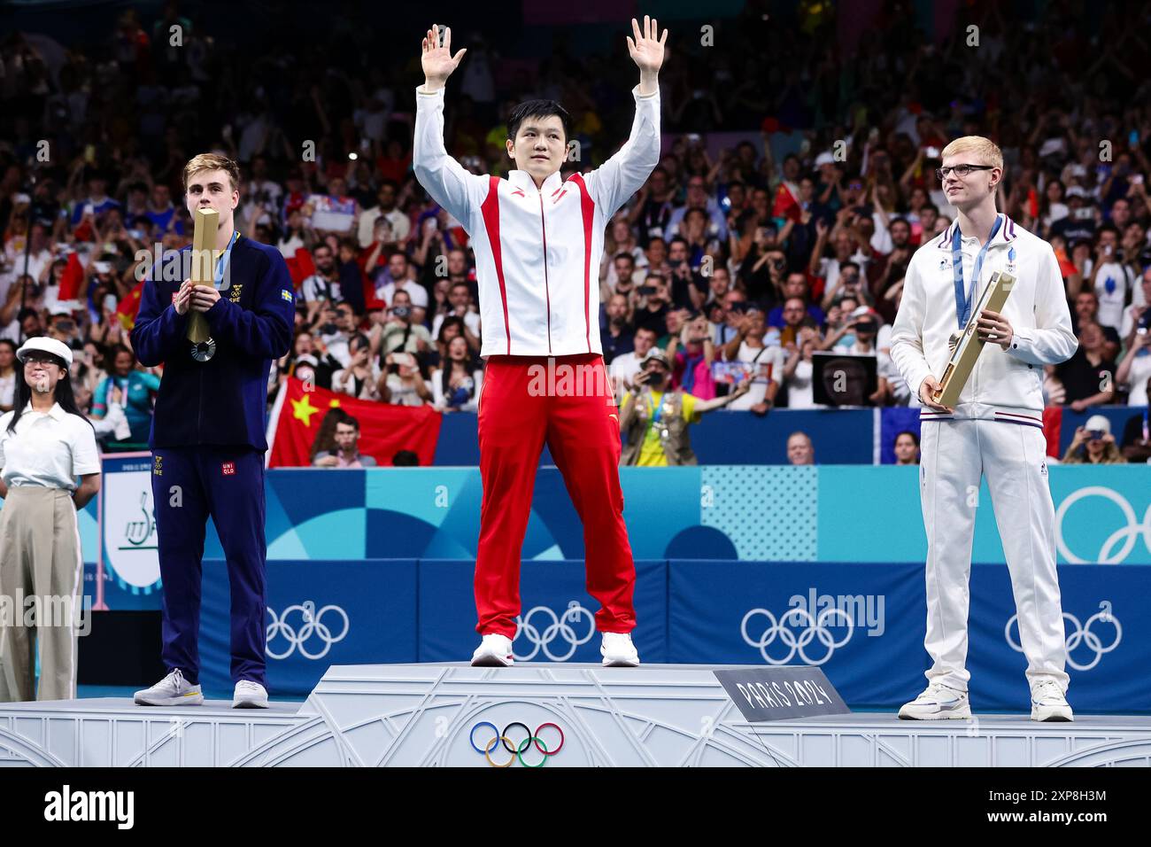 Paris, France, 4 August, 2024. Fan Zhendong of China celebrates winning ...