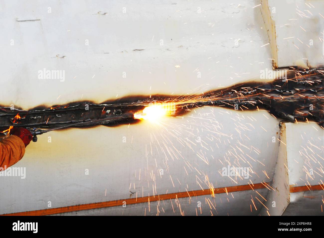 Autogen cutting an old broken down vehicle with an autogen. Metal ...