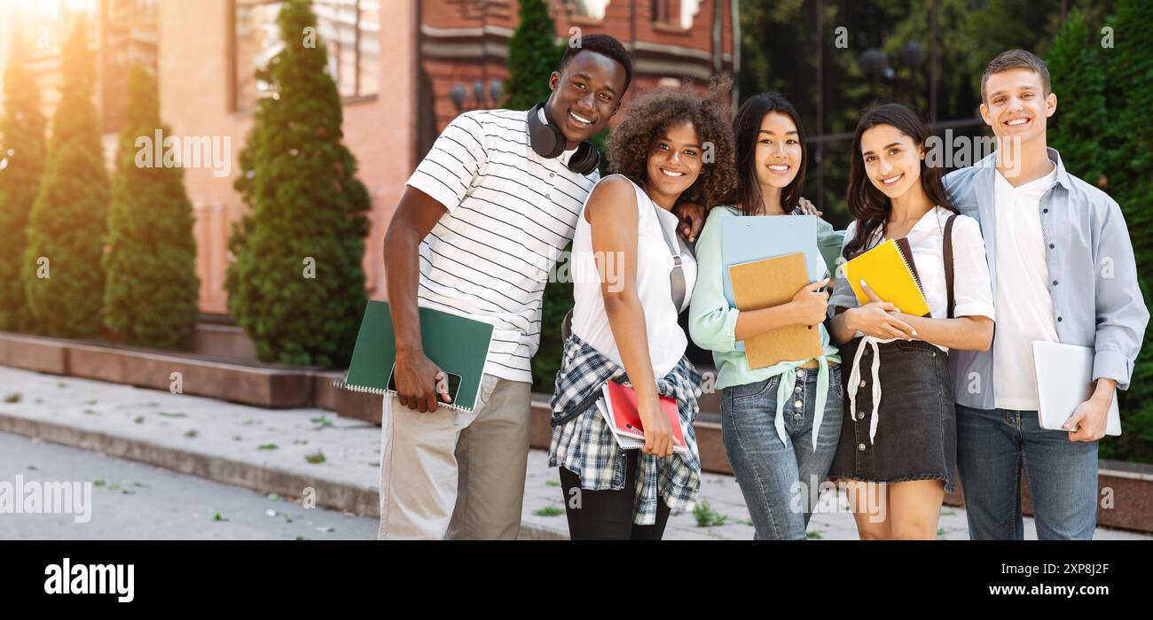 Group portrait of multicultural college students posing in campus Stock ...
