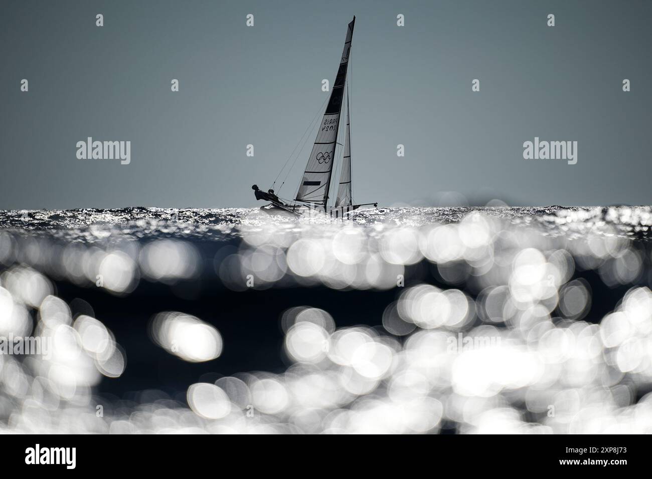 Anna Burnet and John Gimson of Britain compete in the mixed multihull ...