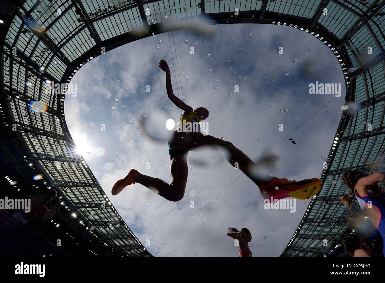 Cara Feain-Ryan, of Australia, competes in a heat of the women's 3000 ...