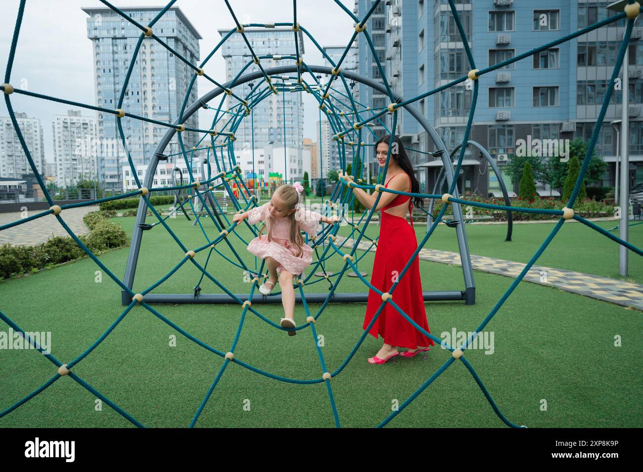 Mother and Daughter Enjoying Playtime Together at Urban Playground ...