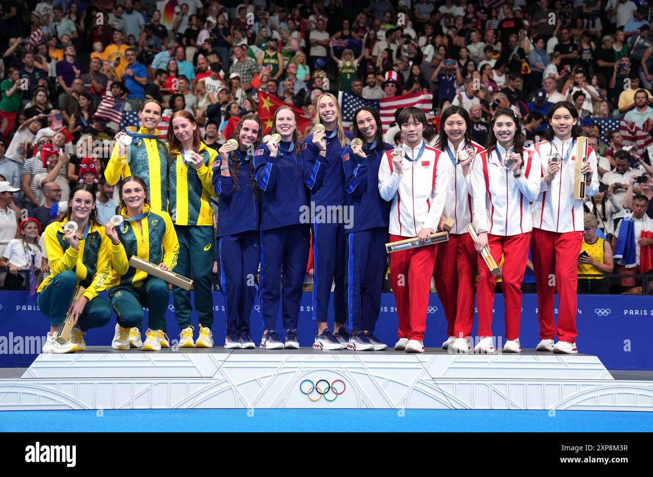 Paris, France. 4th Aug, 2024. Gold medalists Team USA (C), silver medalists Team Australia and ...