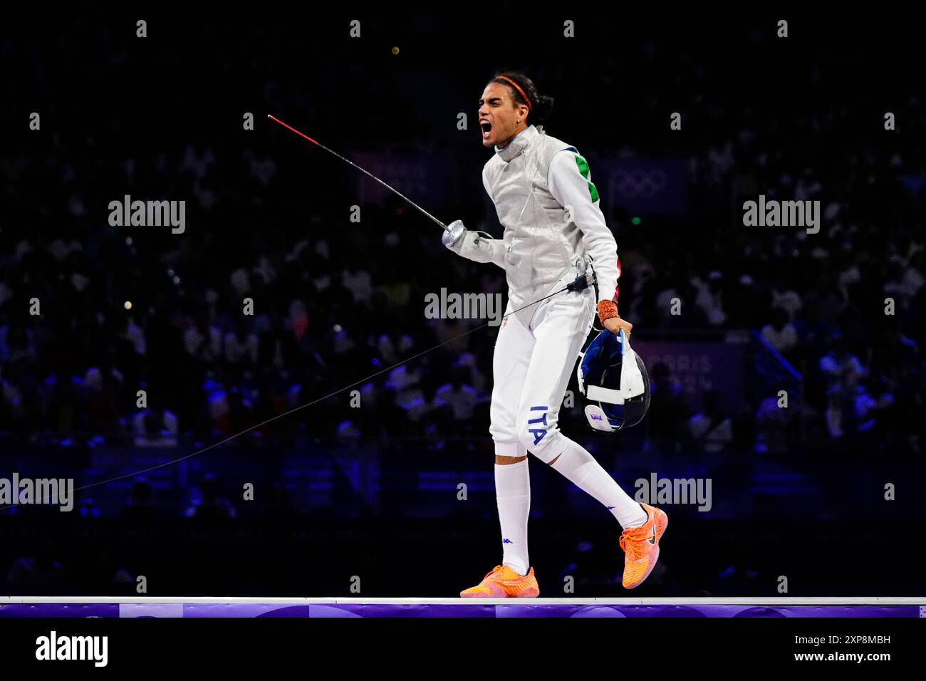 Italy's Tommaso Marini reacts as he competes with Japan's Kyosuke ...