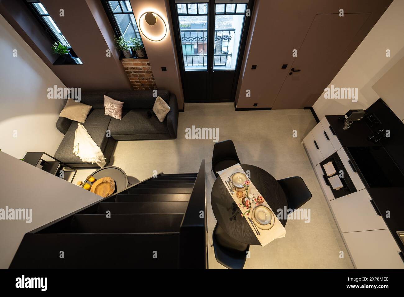 Modern studio apartment with a mezzanine bedroom. Stylish kitchen ...