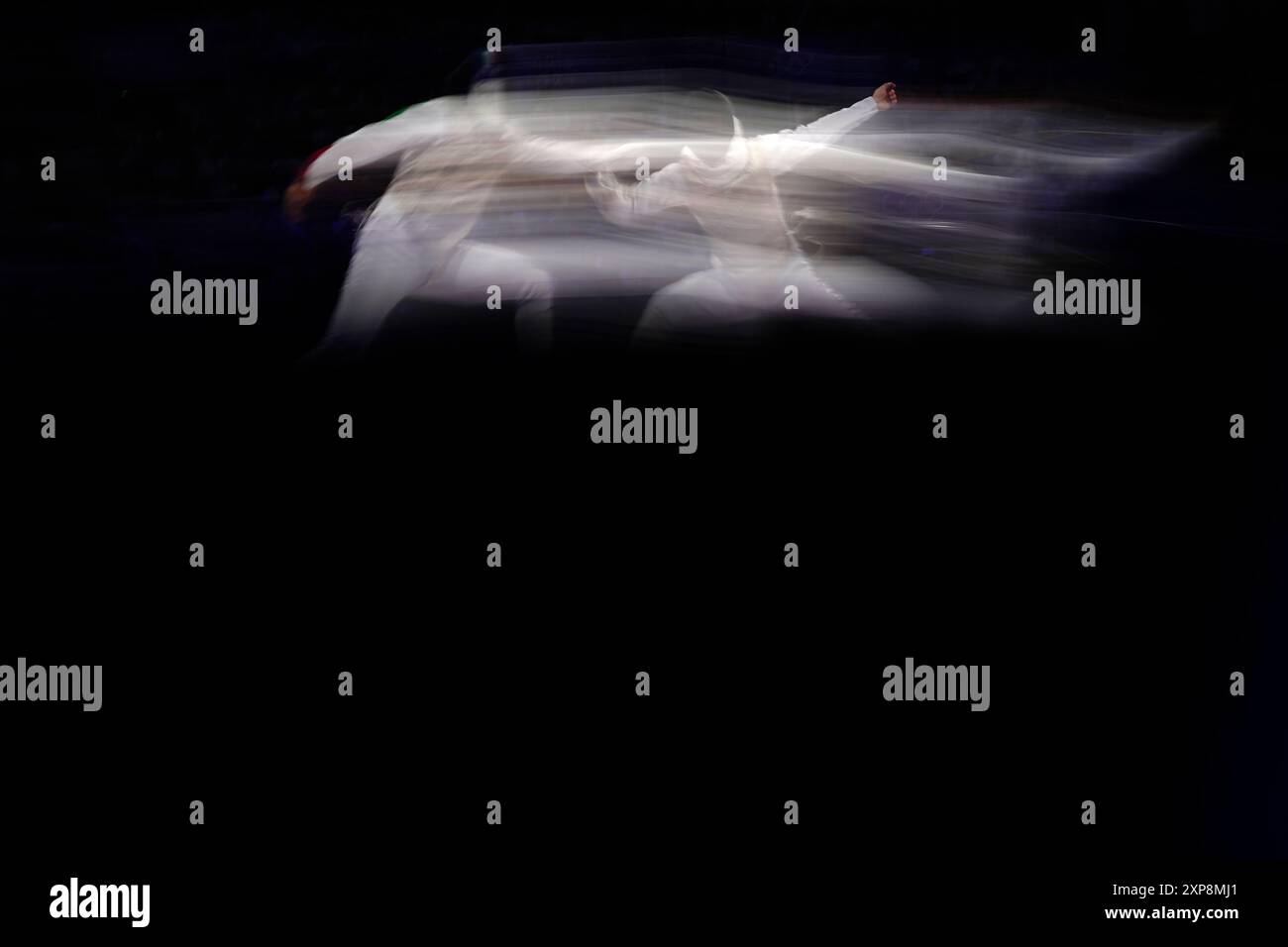 Italy's Filippo Macchi competes with Japan's Kazuki Iimura in the men's ...