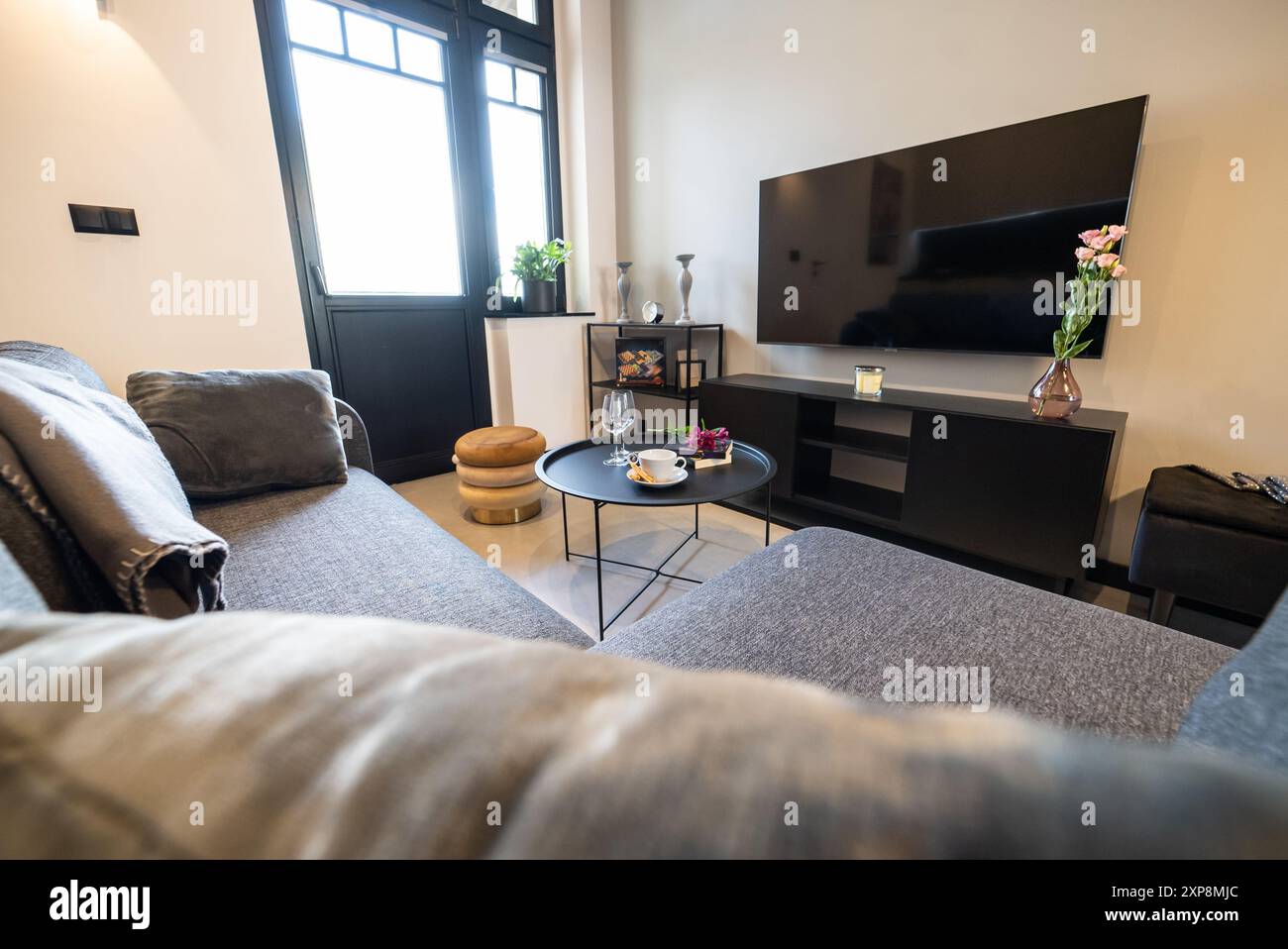 The Chic and Cozy Interior of a Modern Living Room Featuring a Stylish ...