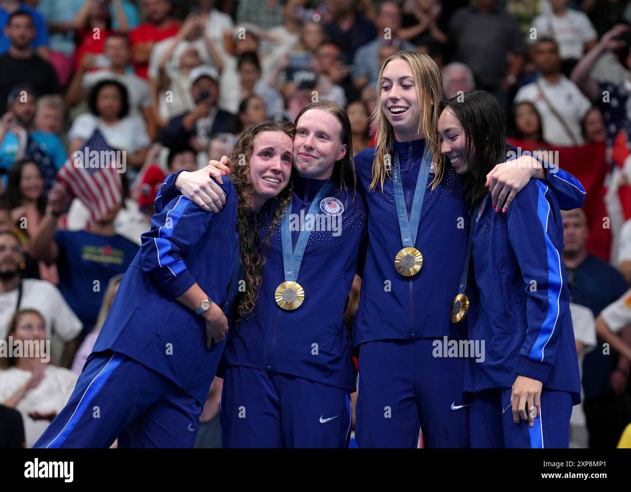 Paris, France. 4th Aug, 2024. Gold medalists team USA attend the victory ceremony for the women ...