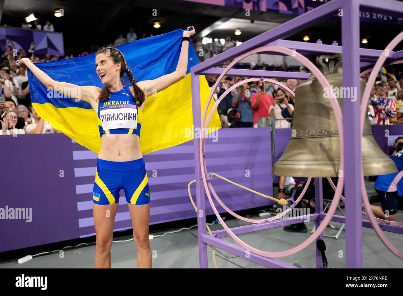 Yaroslava Mahuchikh, of Ukraine, reacts after ringing the bell after ...