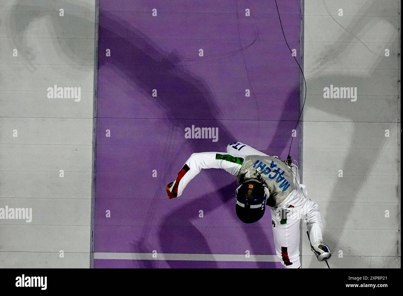 Italy's Filippo Macchi competes with Japan's Kyosuke Matsuyama in the ...