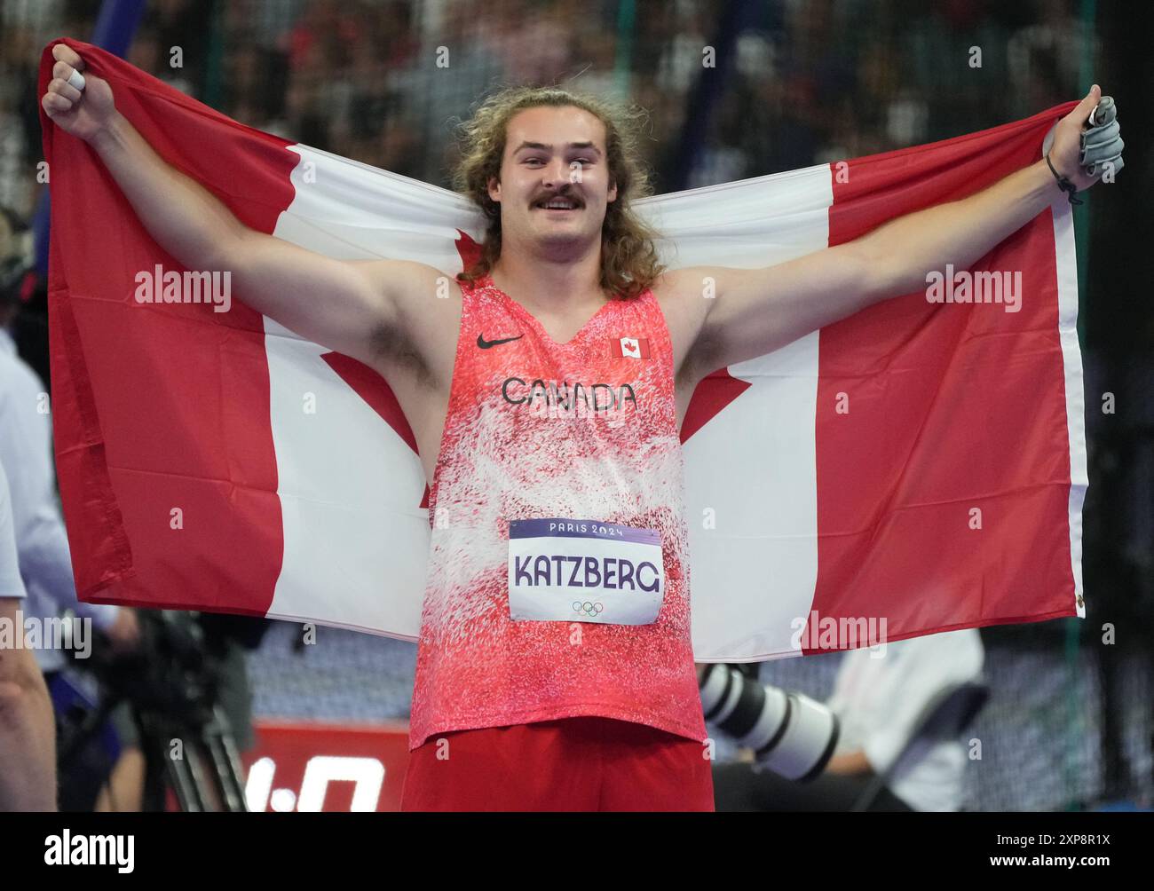 Ethan Katzberg of Canada celebrates after winning the gold medal in the ...