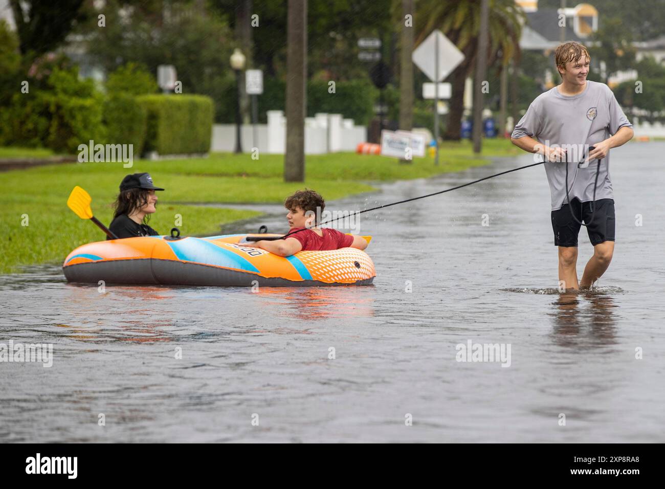 Landon Stanley pulls his friends Jakob Jackson and Emerson Porcelli ...