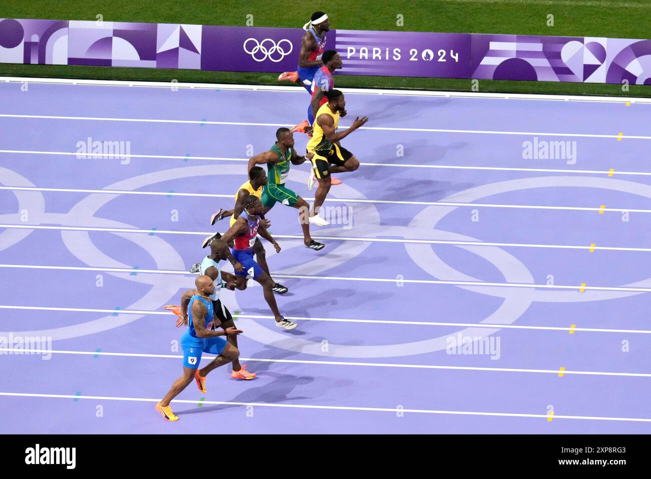 Runners compete in the men's 100-meter final at the 2024 Summer ...
