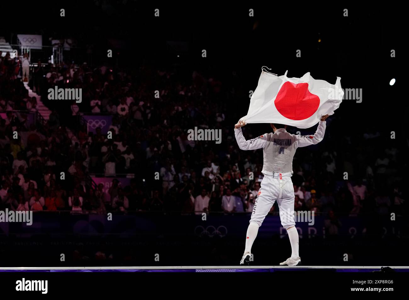 Japan's fencers Kyosuke Matsuyama celebrates after winning the men's ...