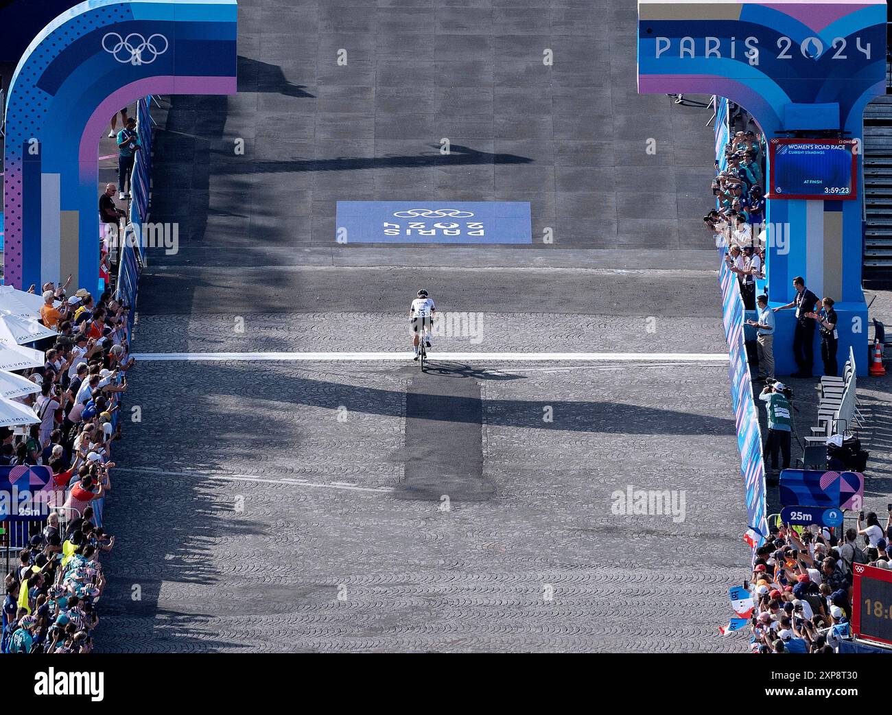 Kristen Faulkner of the United States passes the finish line in the ...