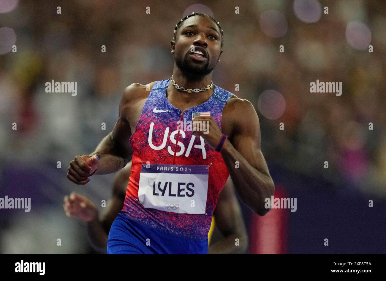 Noah Lyles of the U.S. crosses the finish line to win the gold medal in ...