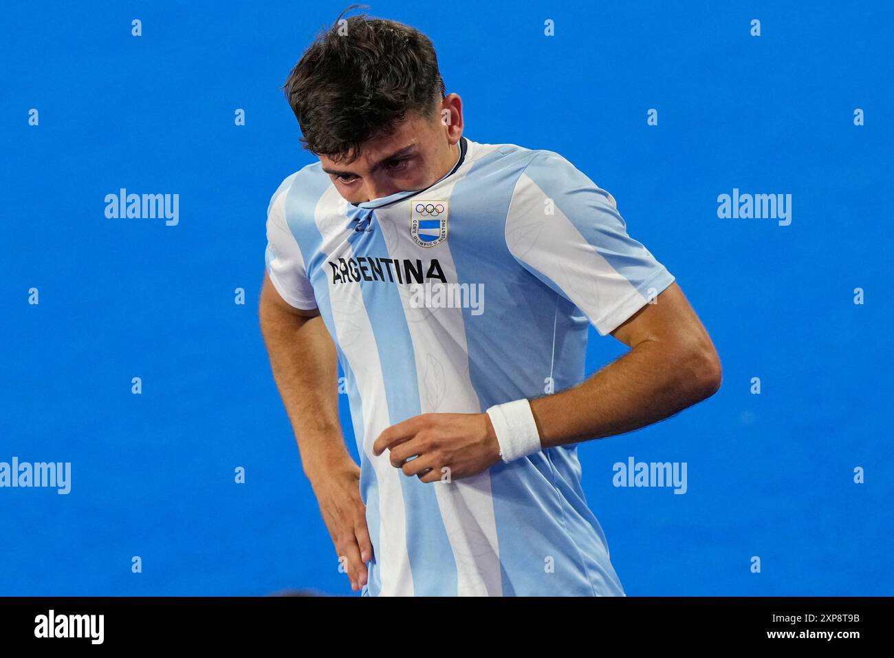 Argentina's Bautista Capurro weeps after their loss against Germany in ...