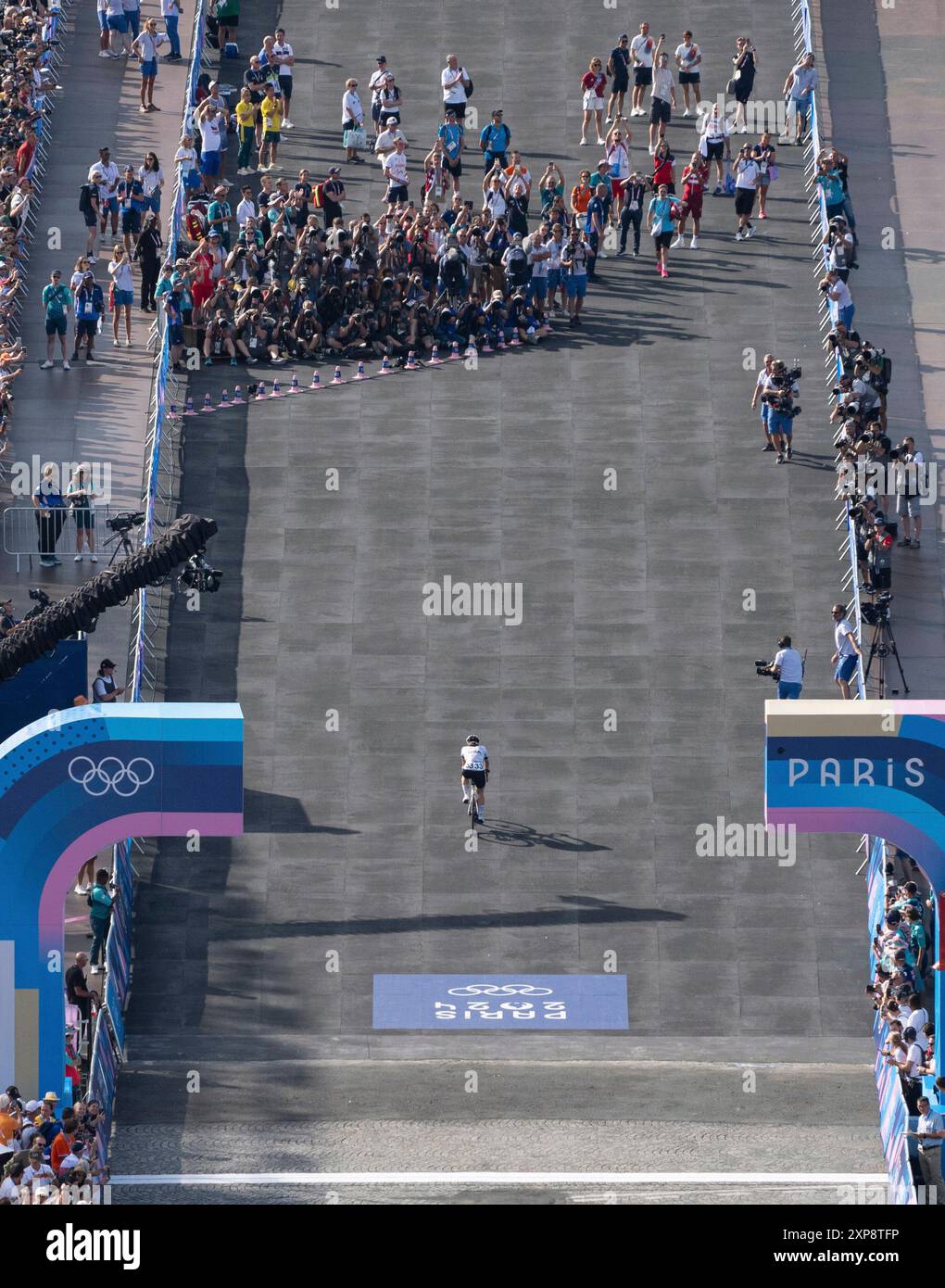 Kristen Faulkner of the United States passes the finish line in the ...