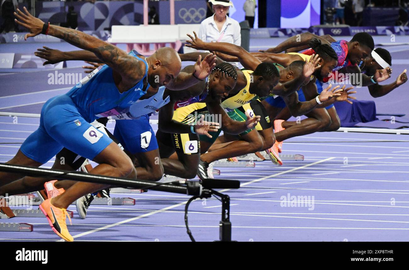 Athletes start in the men's athletics 100-meter final with a time of 9. ...