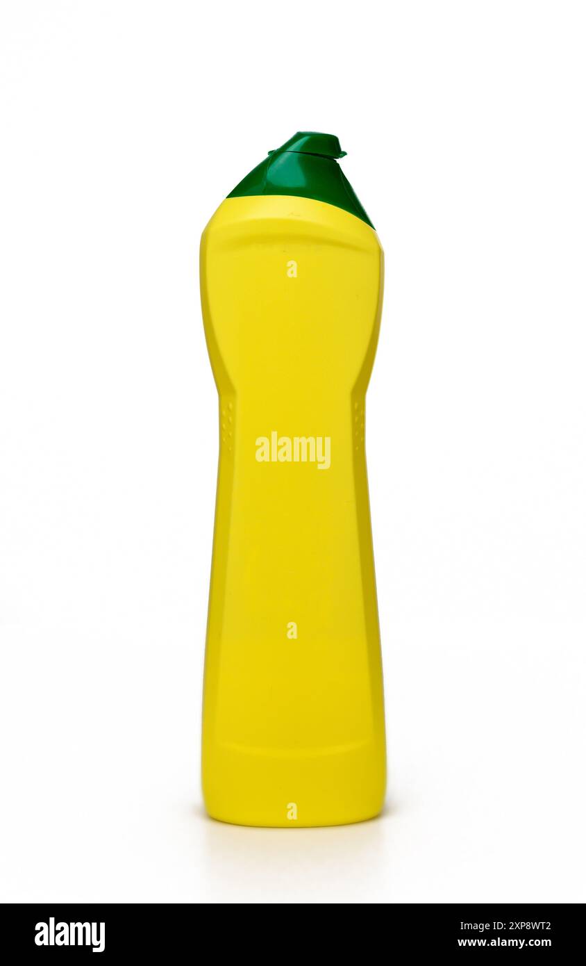 Yellow plastic bottle with cap isolated on white background for liquid ...