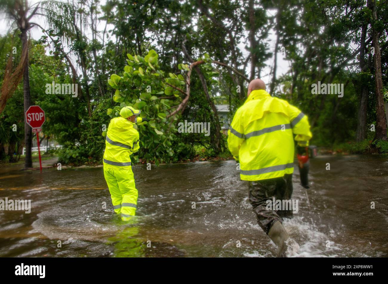 St. Petersburg Stormwater Management workers Mariano Morales, left, and ...