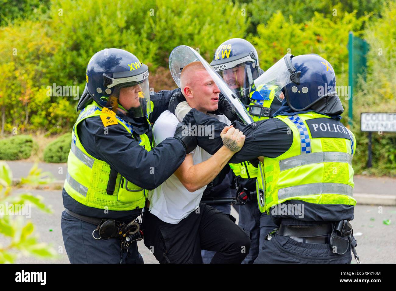 Rotherham, UK. 04 AUG, 2024. Man is detained following clash as ...