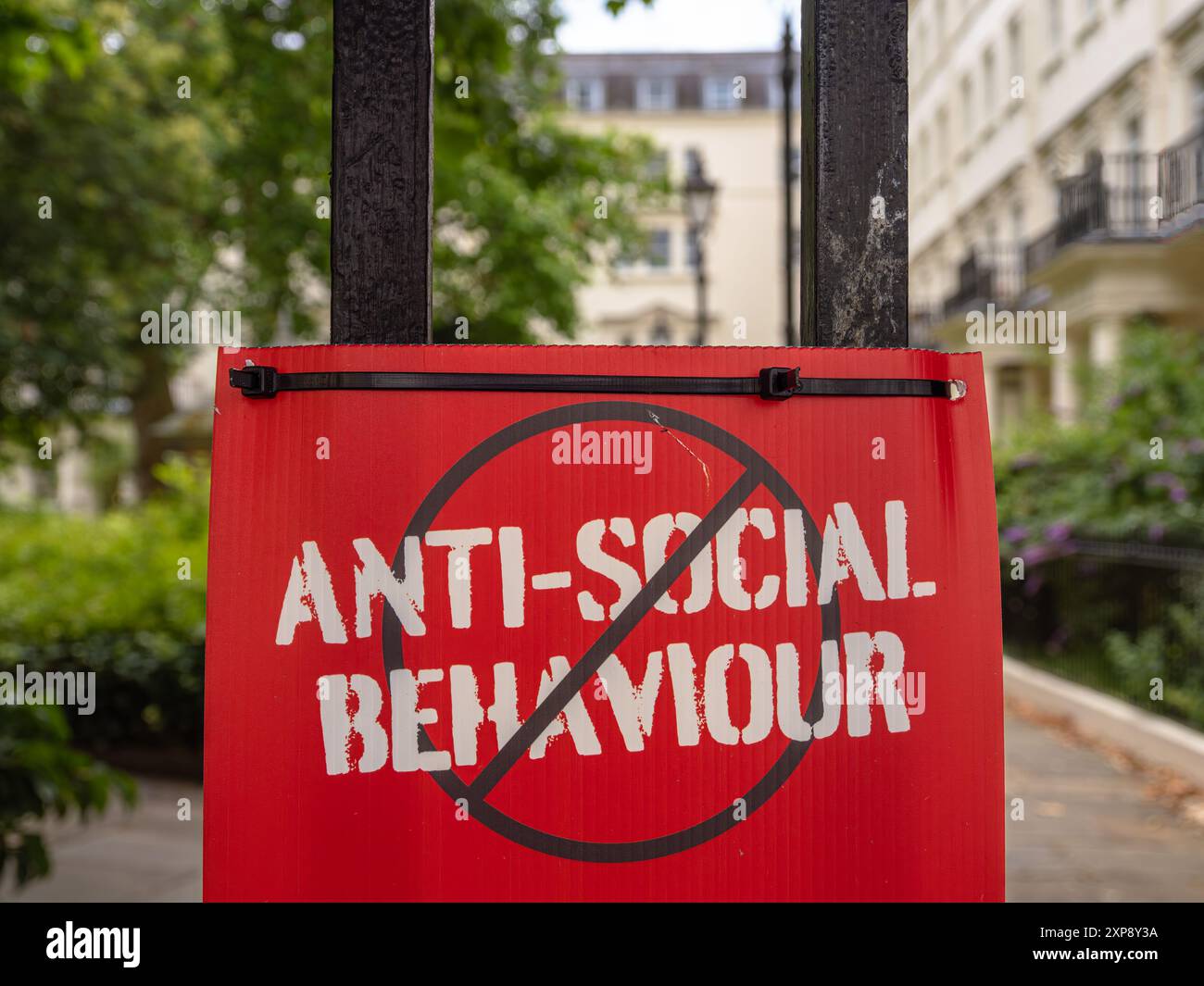 London, United Kingdom - June 25, 2024: Red sign ANTI-SOCIAL BEHAVIOUR ...
