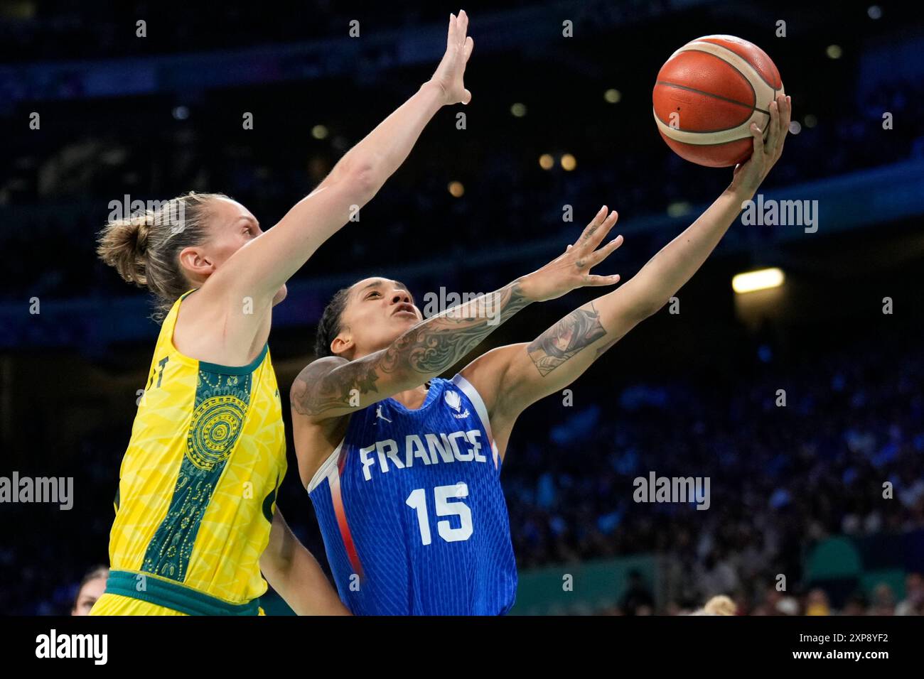 Gabby Williams (15), of France, shoots under Steph Talbot (6), of ...