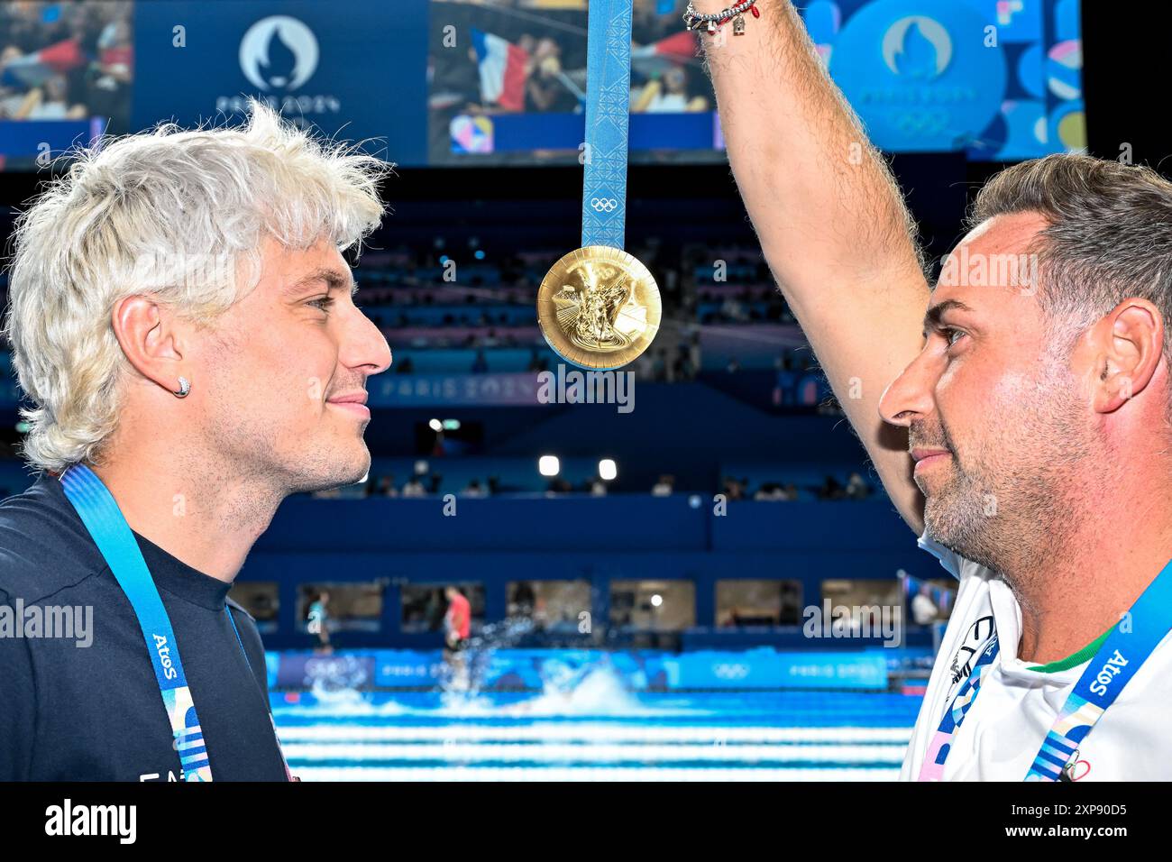 Paris, France. 04th Aug, 2024. Nicolo Martinenghi of Italy and his coach Marco Pedoja show the ...