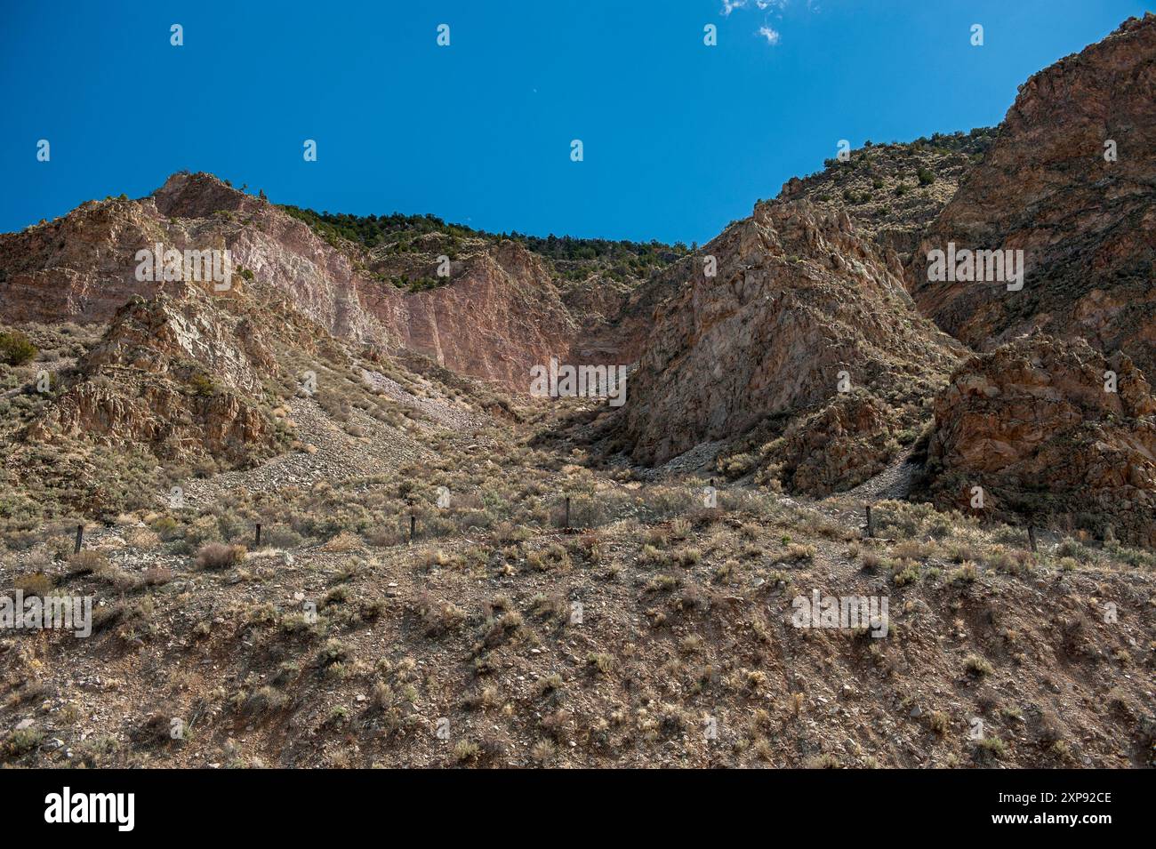 Pink cliffs of unknown geology on the east wall of the Rio Grande Gorge ...