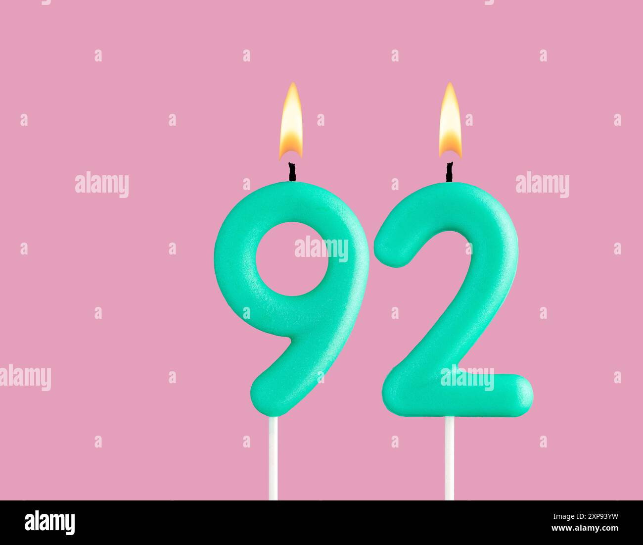 Green candle number 92 - Birthday card on pastel pink background Stock ...