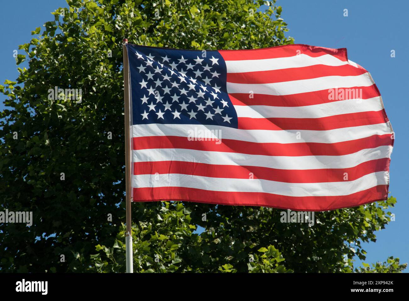 United states flag flying in hi-res stock photography and images - Alamy