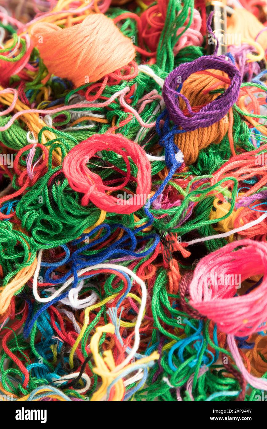 Pile of multi-colored thread, yarn used in hair braiding Stock Photo ...