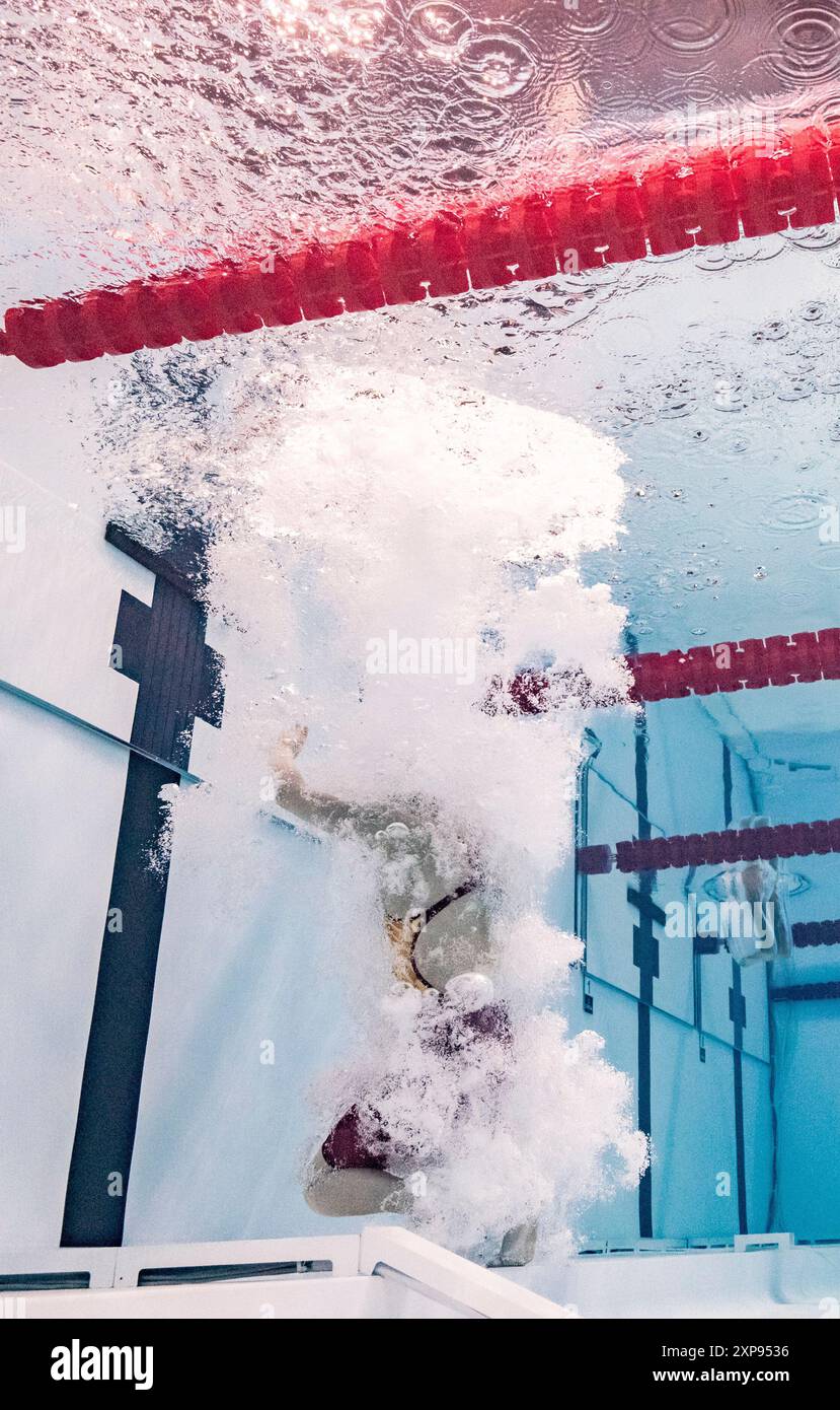 Paris, France. 4th Aug, 2024. Wan Letian of China dives into the pool ...