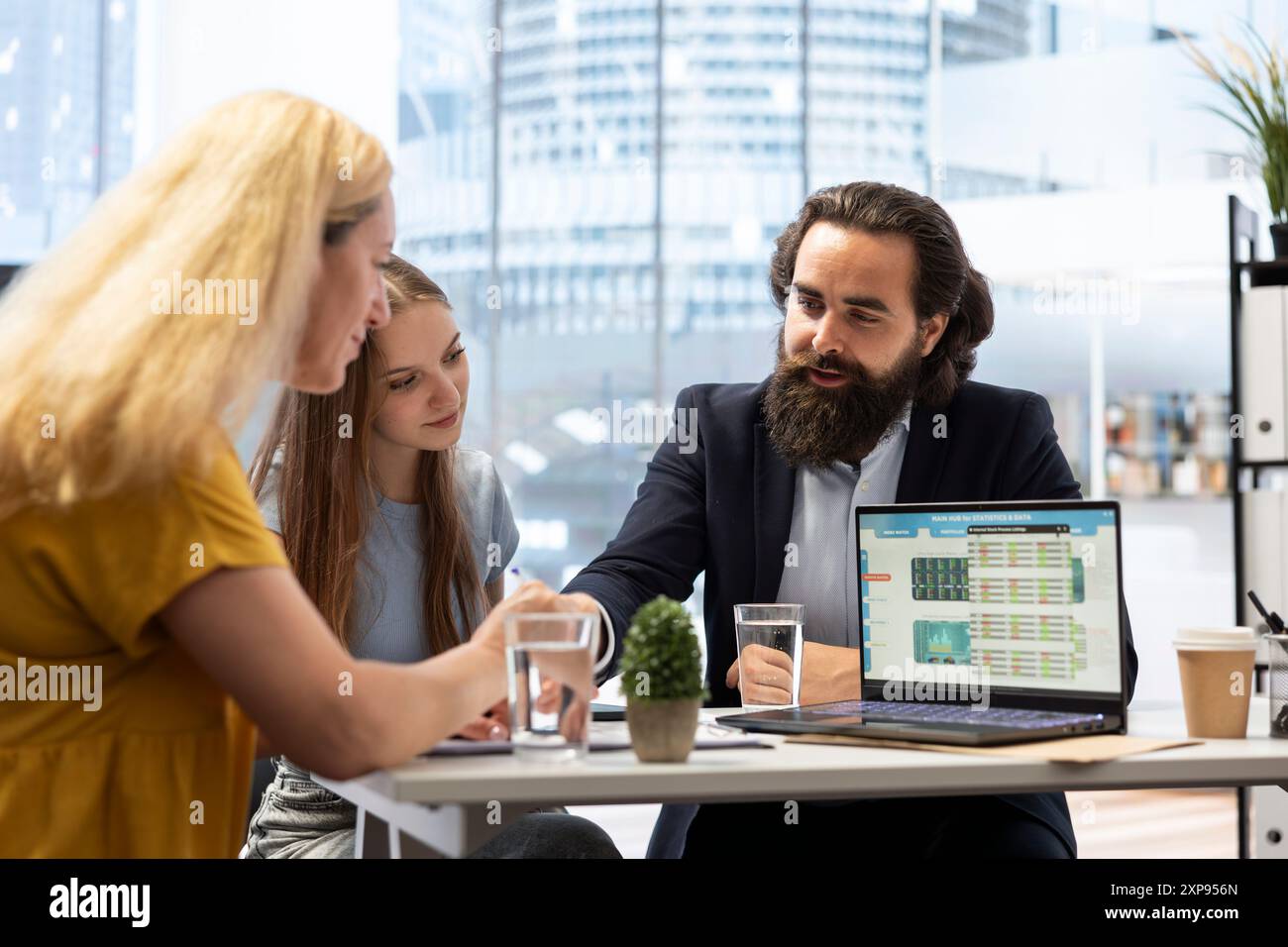 Financial advisor presenting strategies customers hi-res stock ...
