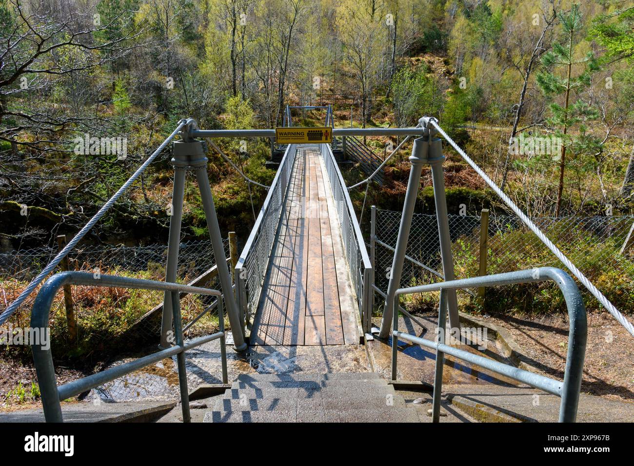The footbridge at the Corrieshalloch Gorge on the Abhainn Droma river ...