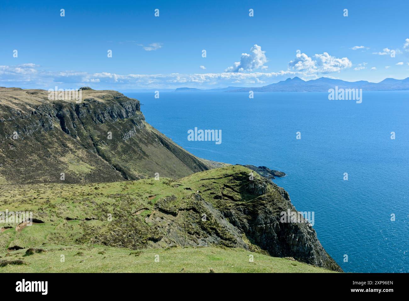 The Isle of Rum from the coastal cliff top walk below Beinn an Eòin on ...