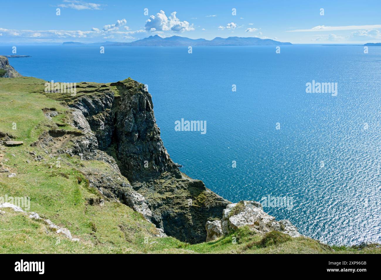 The Isle of Rum from the coastal cliff top walk below Beinn an Eòin on ...