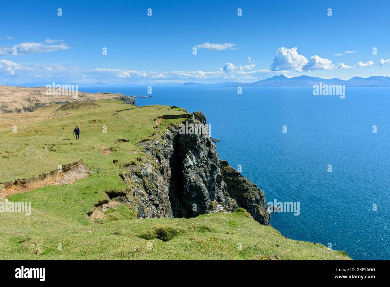 The Isle of Rum from the coastal cliff top walk below Beinn an Eòin on ...