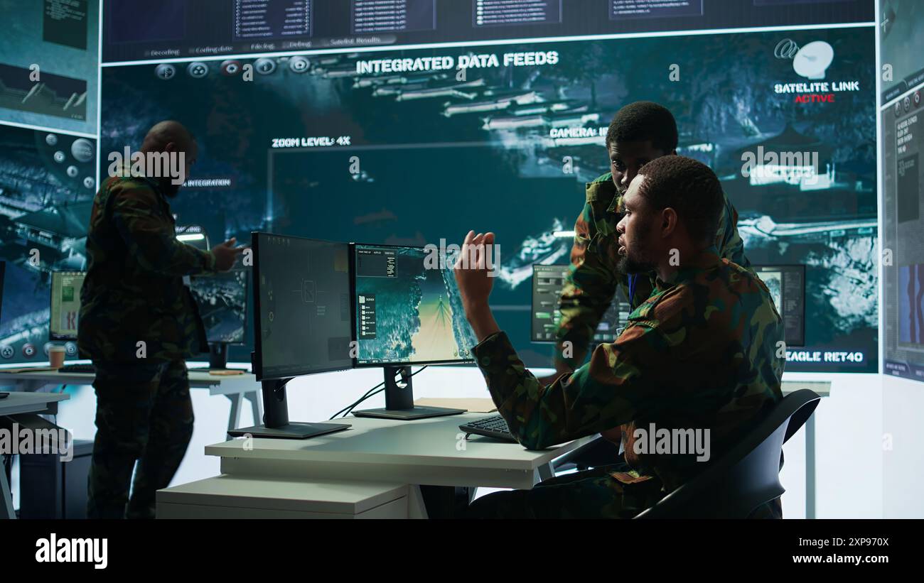 Analyst managing satellite radar hi-res stock photography and images ...