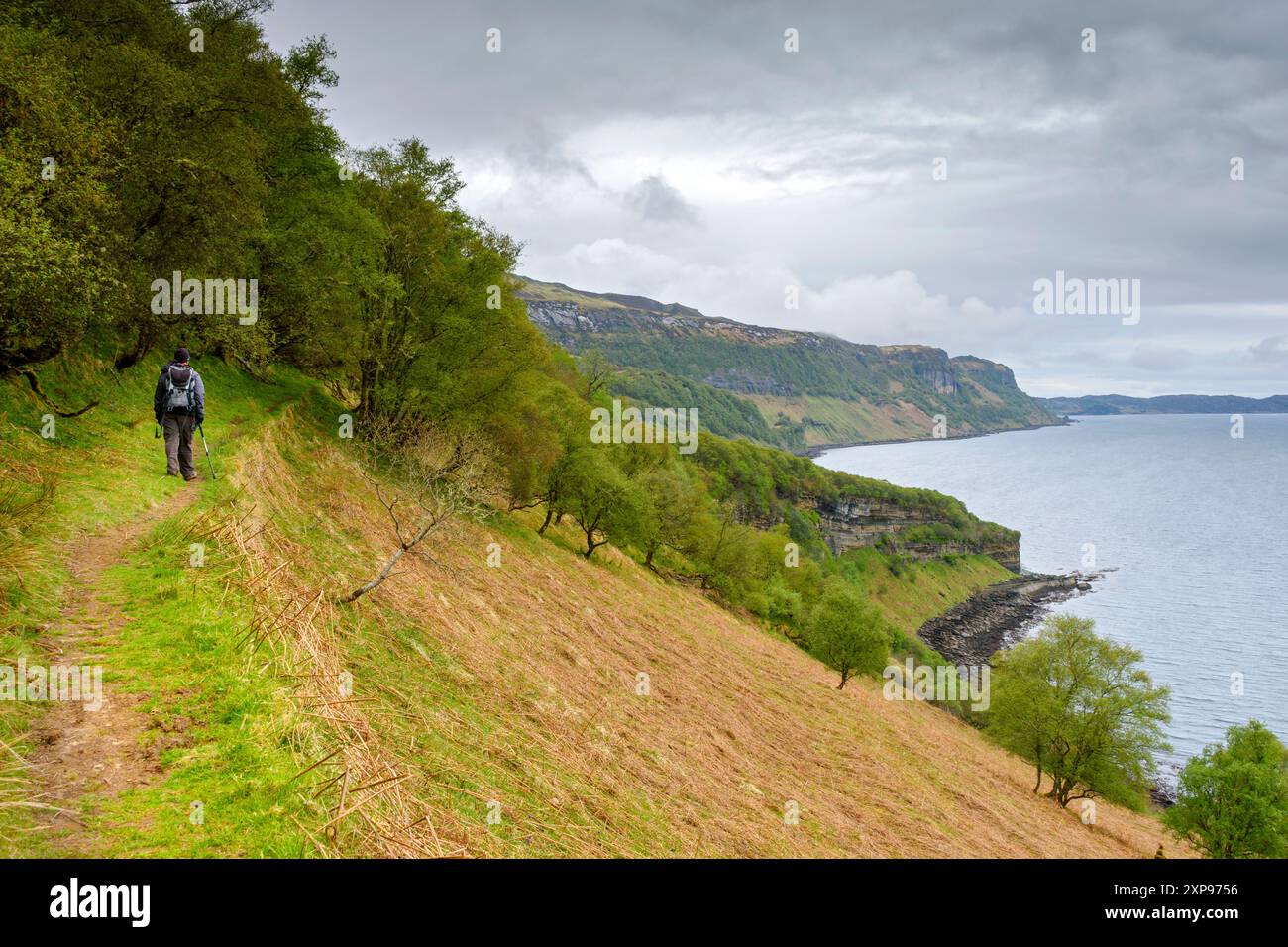 A walker on the track which leads to the deserted township of Hallaig ...