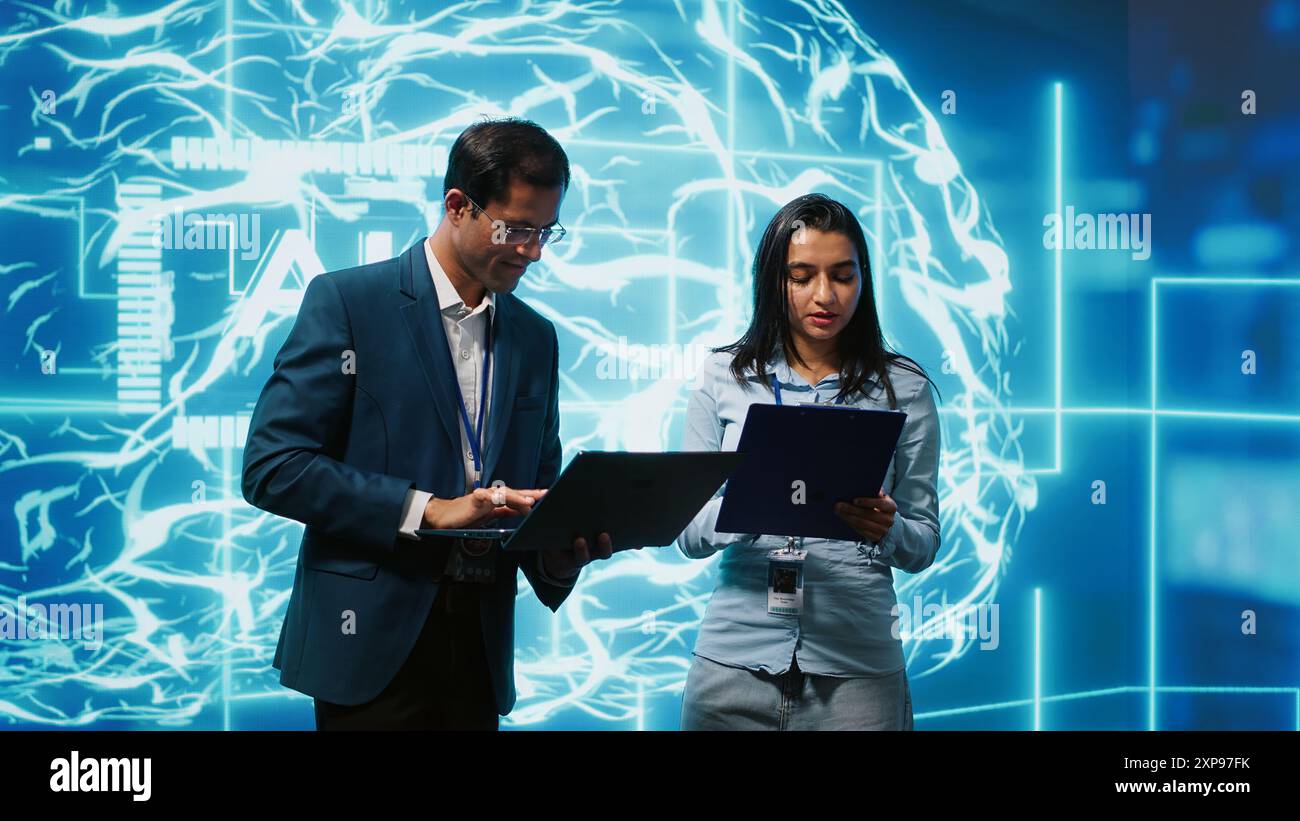 AI researcher and coworker working with artificial intelligence neural ...